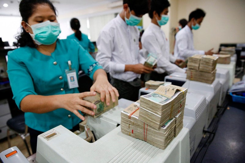 Cash shortages bug businesses and consumers in Myanmar | Mizzima ...