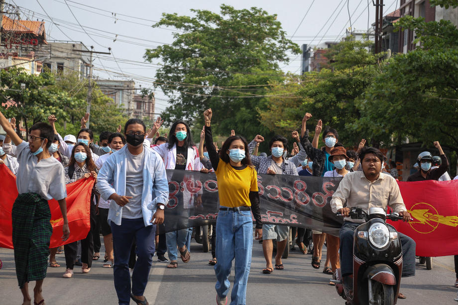 Myanmar protesters throw red paint in the streets as death toll mounts ...