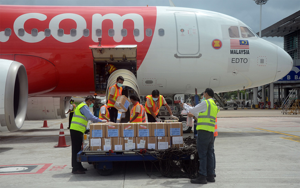 Special flight bringing WHO laboratory equipment arrives in Yangon ...